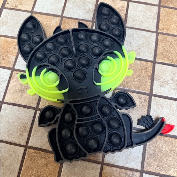 how to train your dragon | Accessories | Toothless Fidget Toy | Poshmark